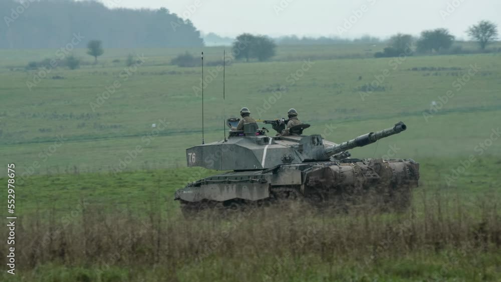 commander and gunner directing action in a British army FV4034 ...