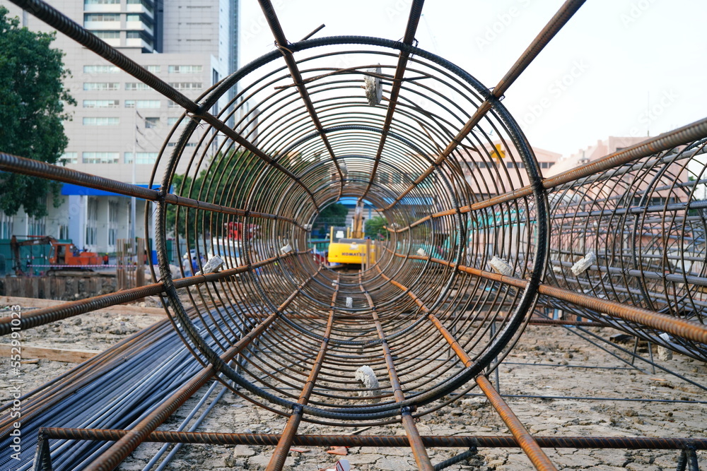 Bounding steel together in a large circle to make the concrete pillars ...