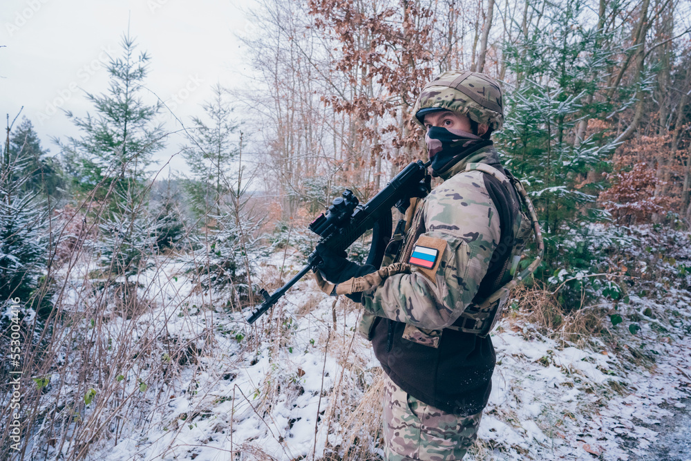 Russian soldier in occupied territory. Soldier patrols with an assault ...