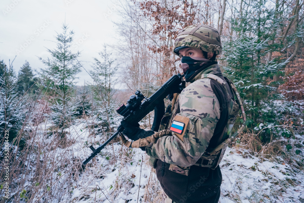 Russian soldier in occupied territory. Soldier patrols with an assault ...