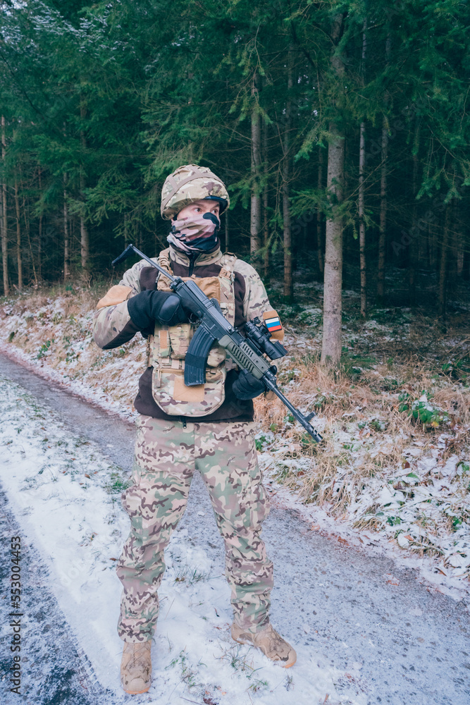 Russian soldier in occupied territory. Soldier patrols with an assault ...