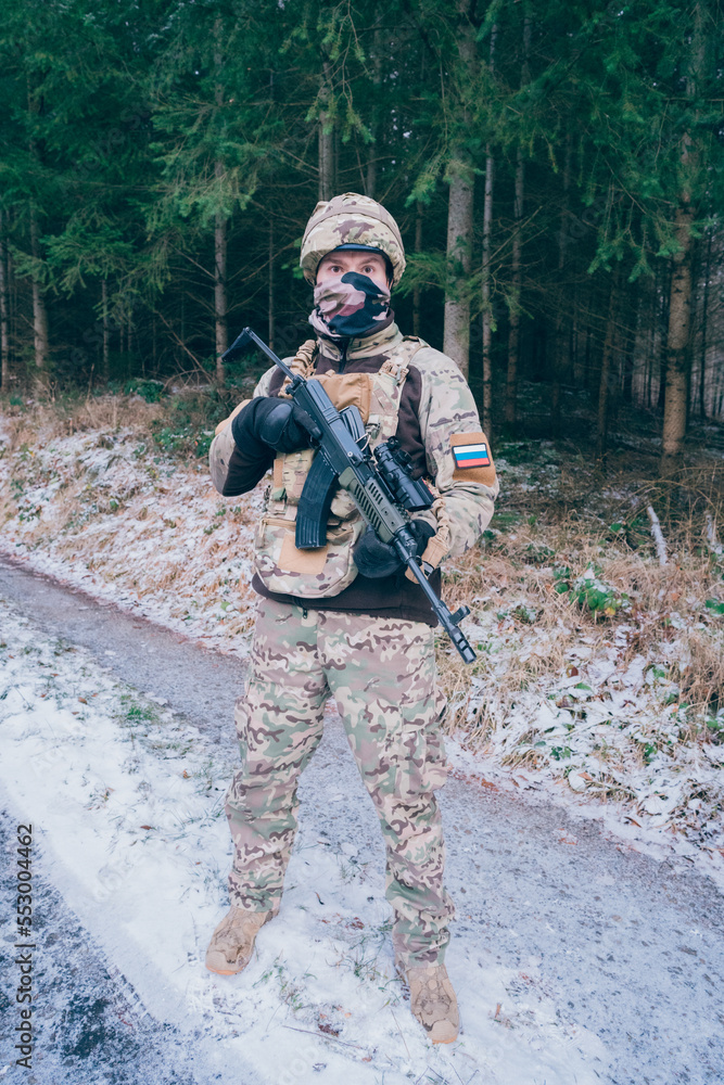 Russian soldier in occupied territory. Soldier patrols with an assault ...