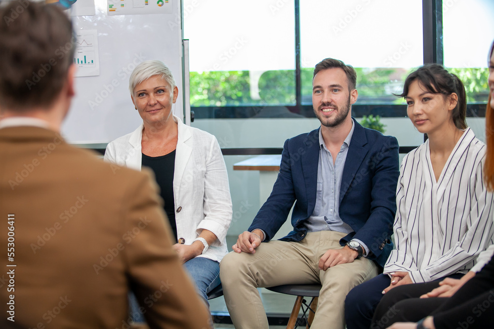 business team male and female colleagues talking at work share ideas ...