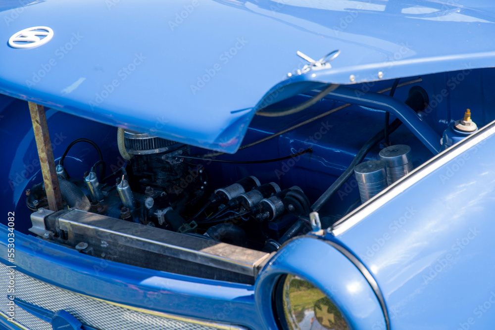blue plastic Trabant with open bonnet and view into the engine ...