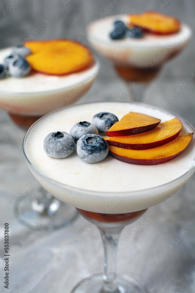 Middle Eastern Milk Pudding - Mahalabia, served in glass cups. It is ...