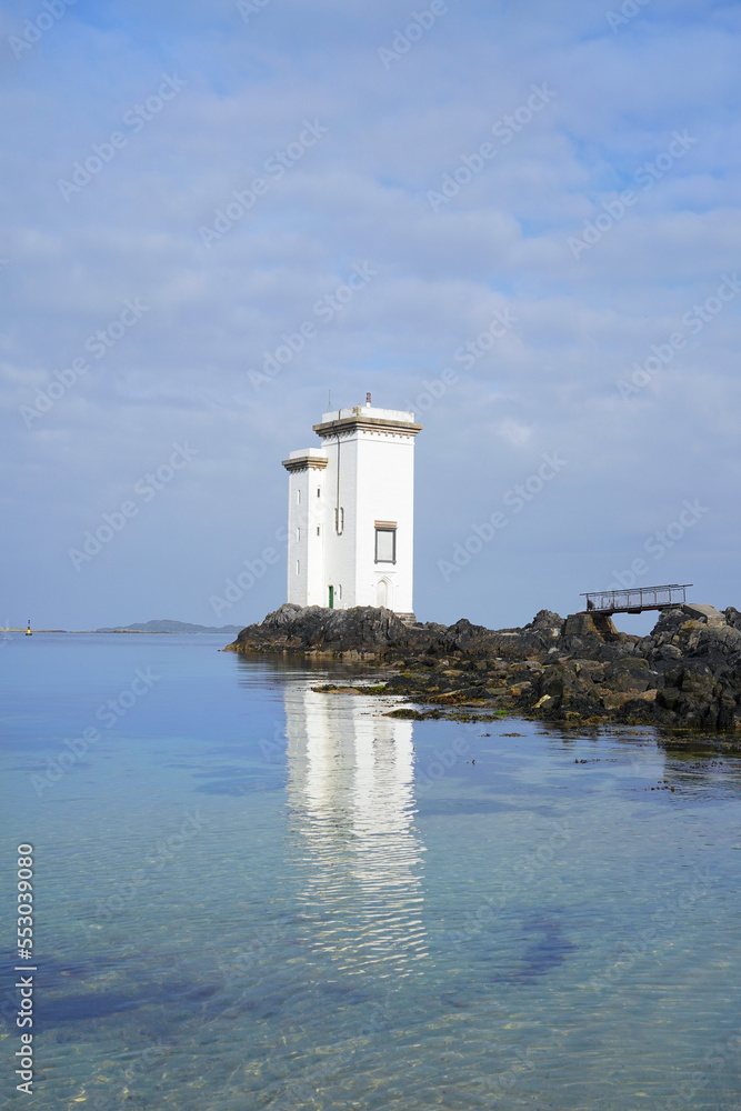 The Carraig Fhada lighthouse near Port Ellen on the isle of Islay Stock ...