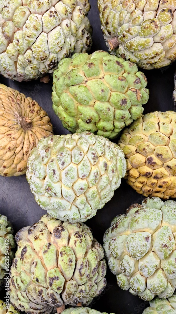 Ashta fruit. located throughout the frame. View from above. Background ...