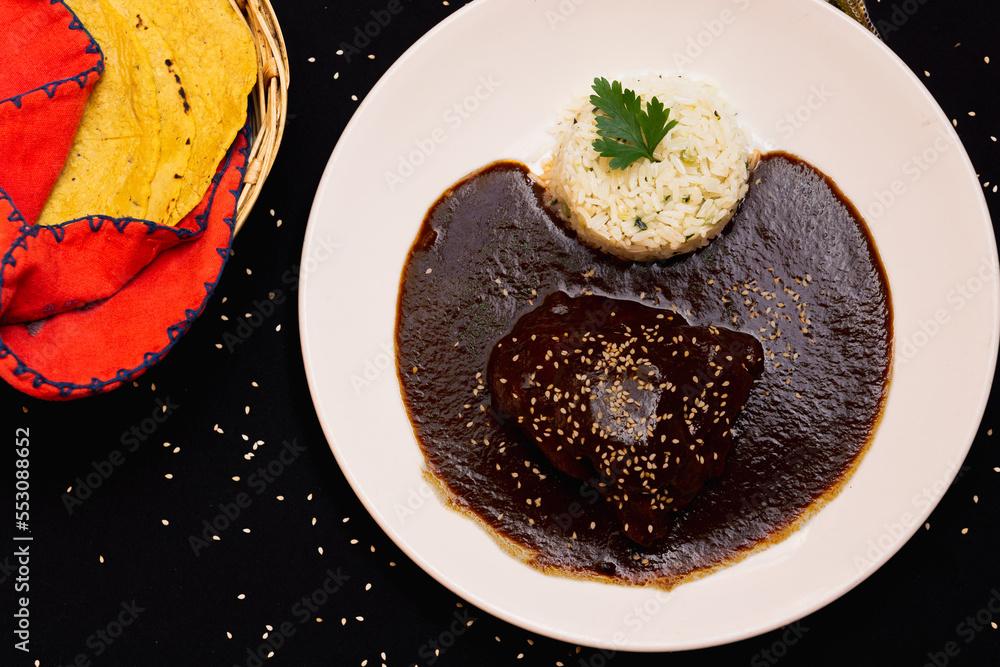 Top view of a Mexican food dish, mole with rice and tortilla. Stock ...