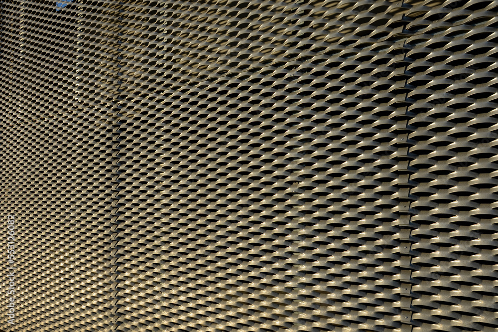 steel cladding of a building with a expanded metal lattice structure ...