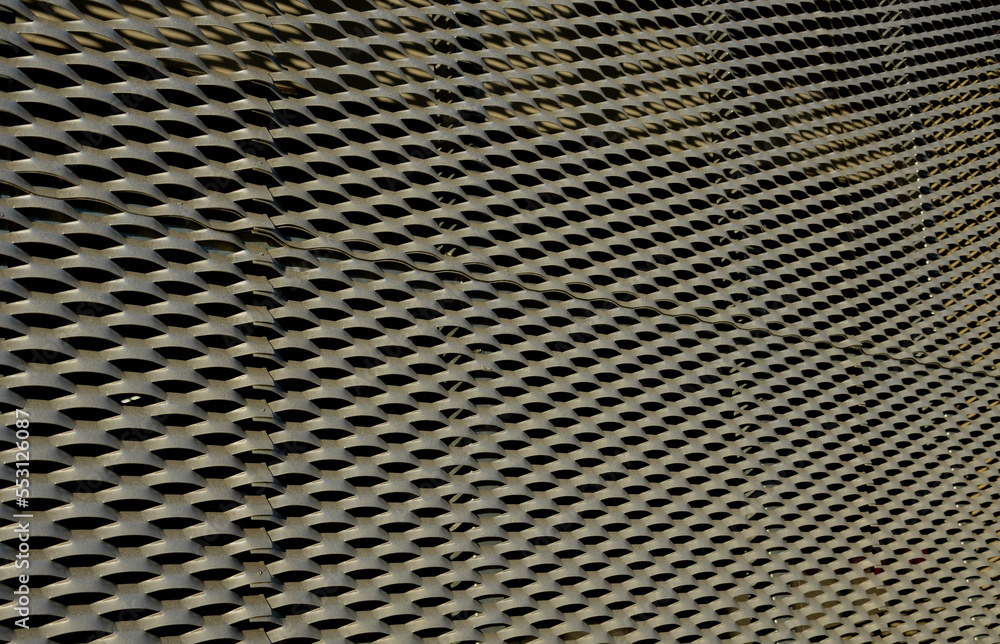 steel cladding of a building with a expanded metal lattice structure ...