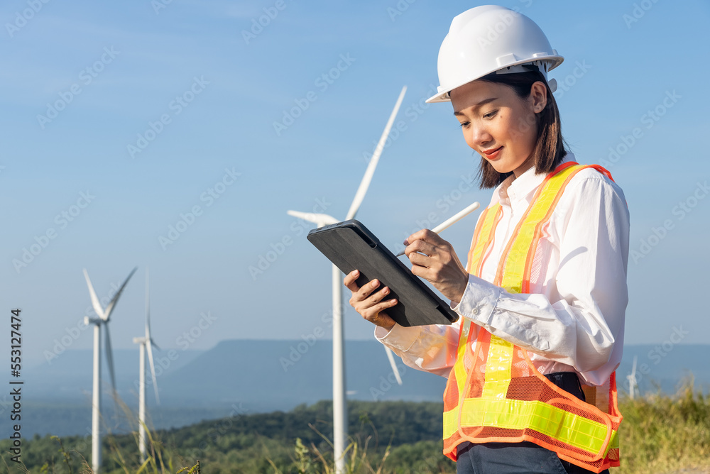 Portrait of beautiful asian woman engineer wearing safety helmet ...