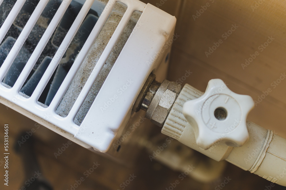 dirty, clogged inside heating radiator convector with regulator Stock ...