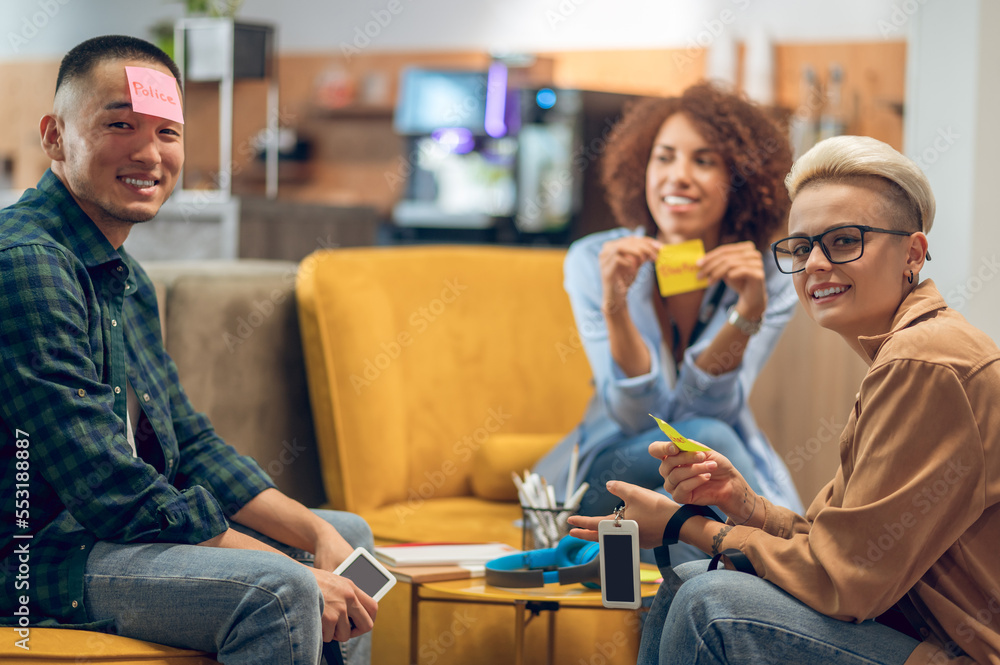 Company of office employees enjoying their leisure activity Stock Photo ...