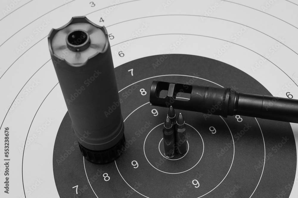 Rifle shooting, target, silencer, rifle barrel with muzzle brake and ...