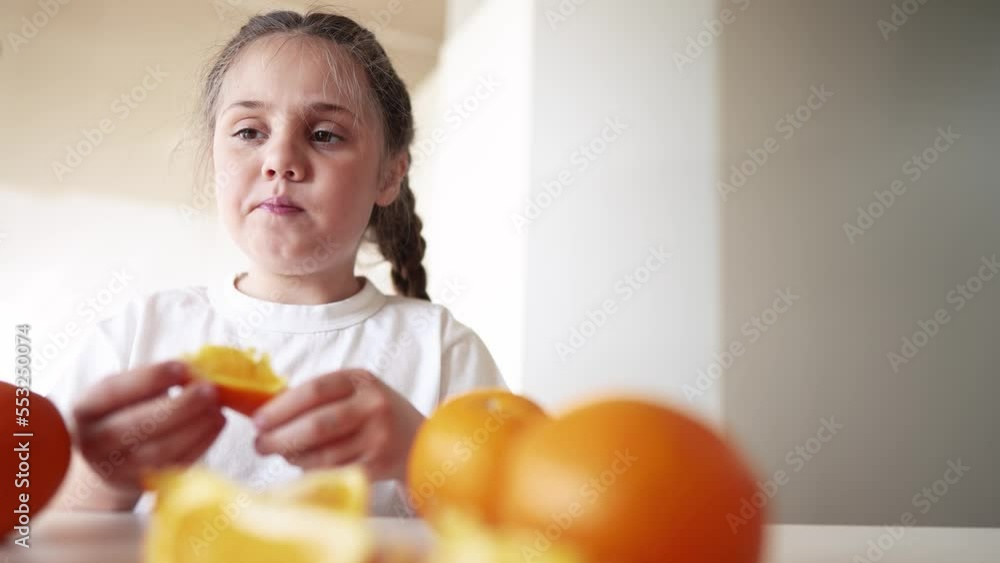 girl child eating oranges. happy family fruit healthy food kid dream ...