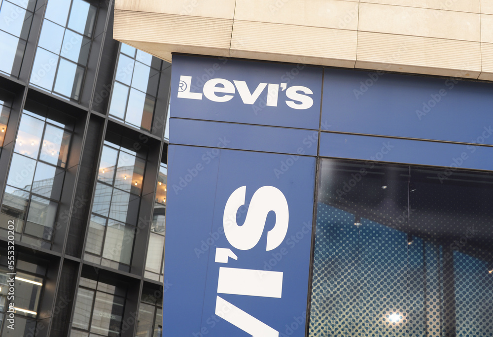 MILAN, ITALY – OCTOBER 8, 2022: Detail of the gable of the Levi's store ...