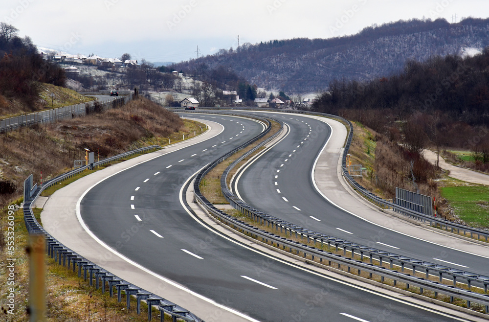 Photo & Art Print Two lanes of a modern highway. Highway curve., algre