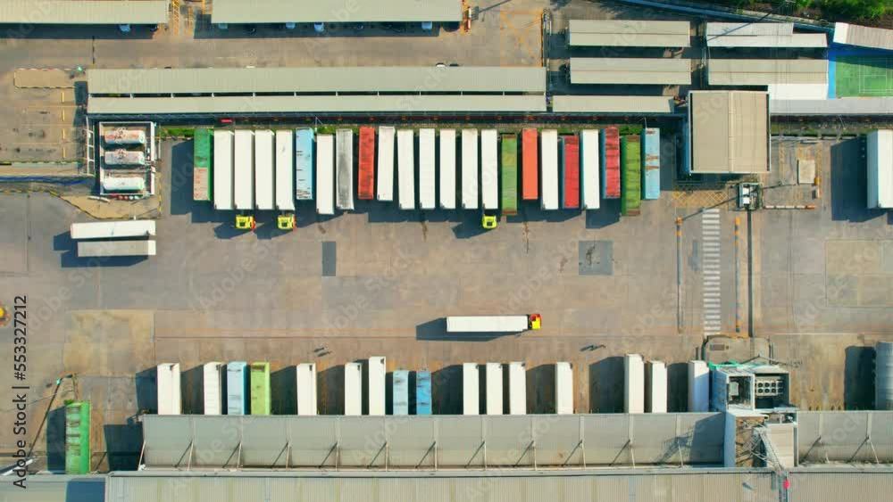4K : Many of Semi-trailer trucks stand at the distribution center ...