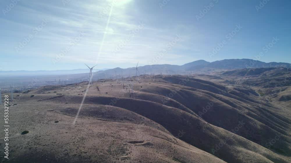 Wind turbines is working on Mountain in California during sun day. Wind ...