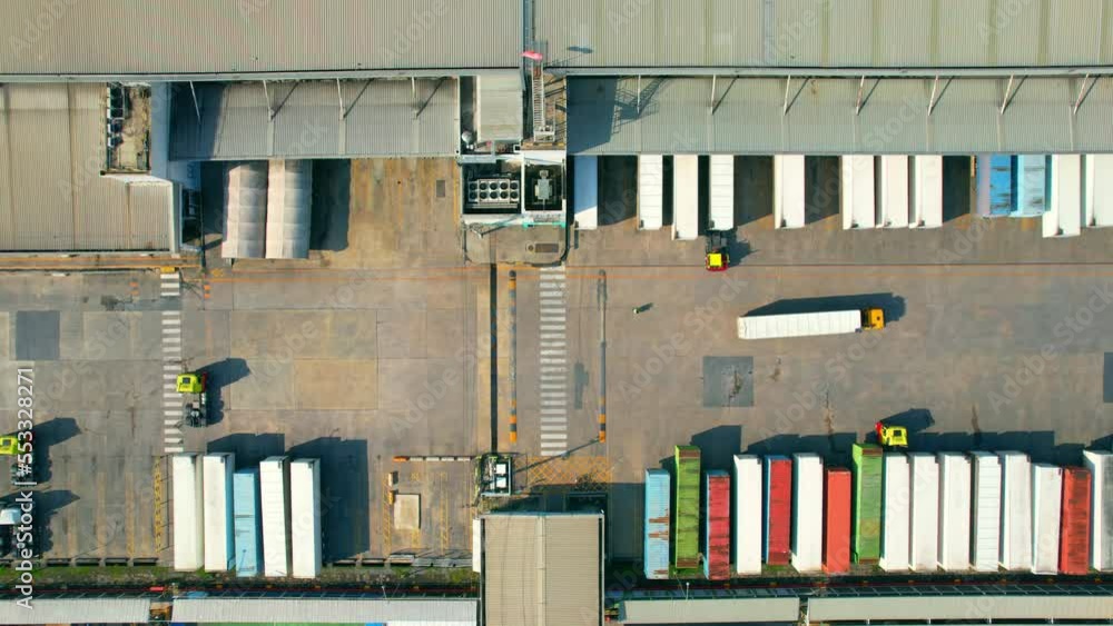 4K : Many of Semi-trailer trucks stand at the distribution center ...