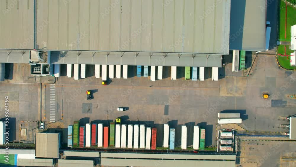 4K : Many of Semi-trailer trucks stand at the distribution center ...