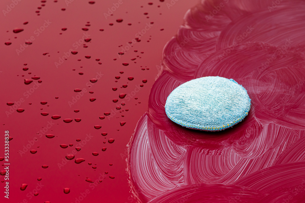 Waxing car with waterdrops, and wax on hood. Before and after ...