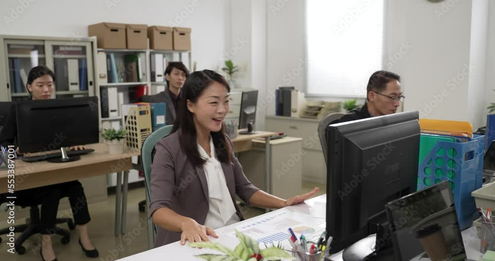 slow motion of overjoyed asian businesswoman and her team clapping ...
