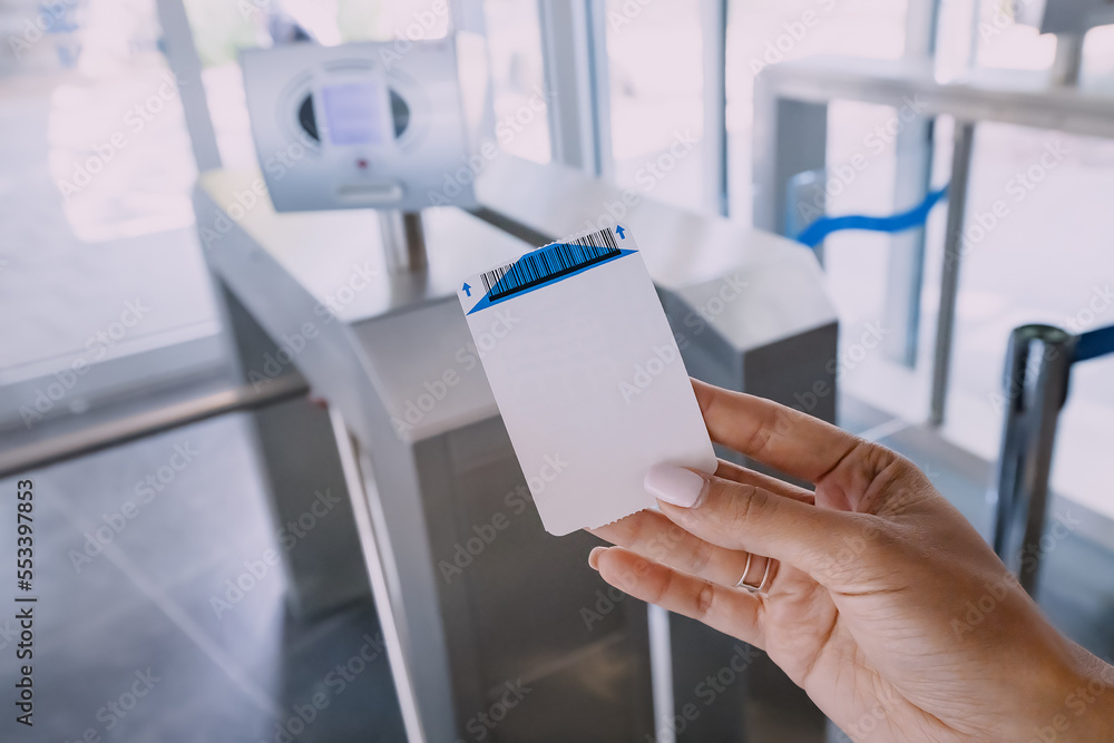 Ticket with bar-code and turnstile access control to public transport ...