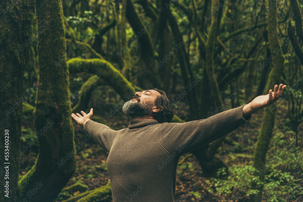 Foto de Nature care environment lifestyle people concept. One man opening arms and hugging the ...