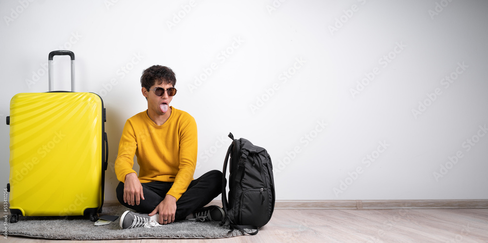Dissatisfied tourist traveler male frowns face, has disgusting ... Dissatisfied tourist traveler male frowns face, has disgusting ...
