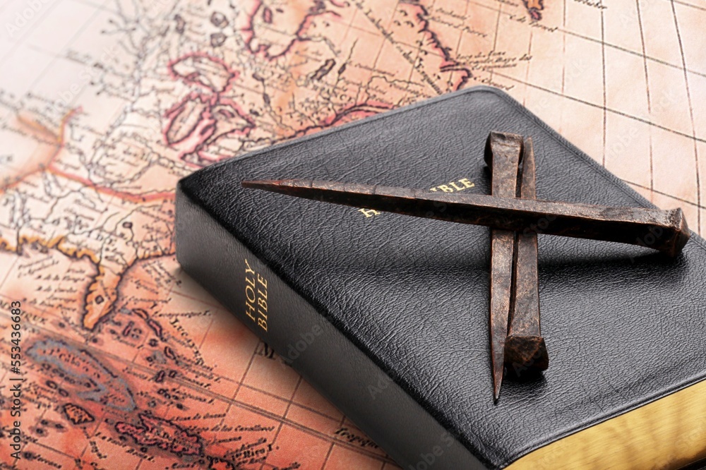 Modern world map and Holy Bible on the map Stock Photo | Adobe Stock
