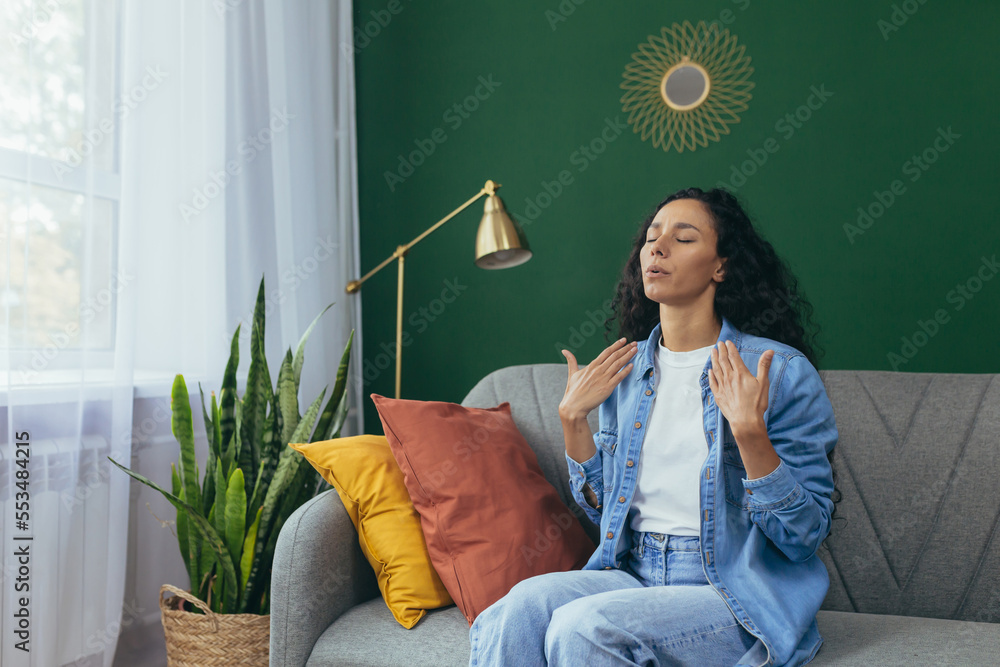 Panic attack woman alone at home scared hispanic woman having trouble ...