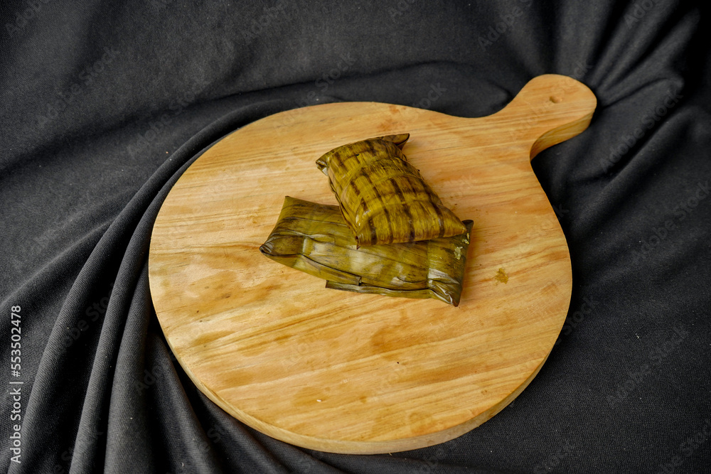 Burasa is an Indonesian rice dumpling, cooked with coconut milk, packed ...