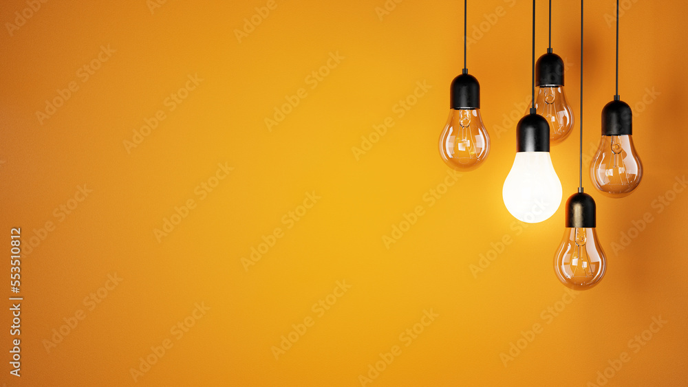 The concept of a light bulbs on an orange background, place for text ...