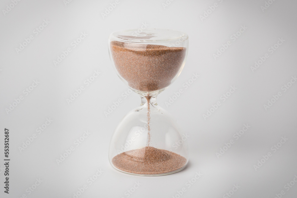 Horizontal view of an hourglass or sandglass shot with studio ...