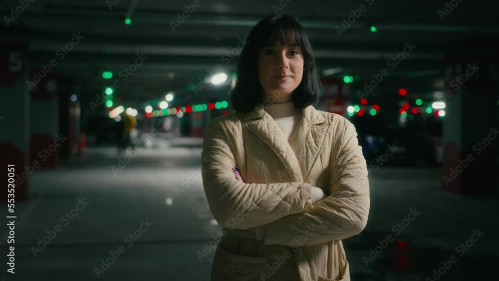 Parking lot dark background alone confident girl lady female worker ...