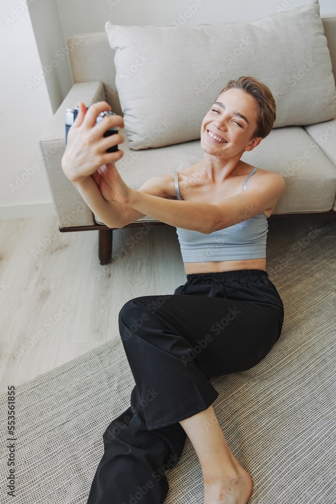 Happy smile woman holding an old camera and taking pictures of herself as a weekend photographer ...