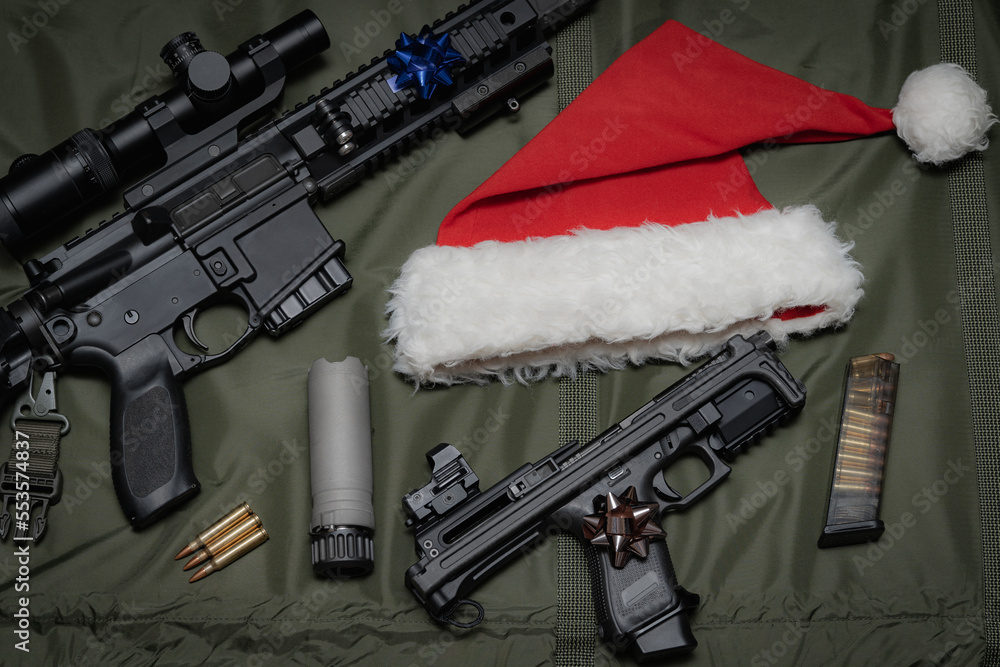Christmas and weapons. A rifle with an optical sight, a tactical pistol ...