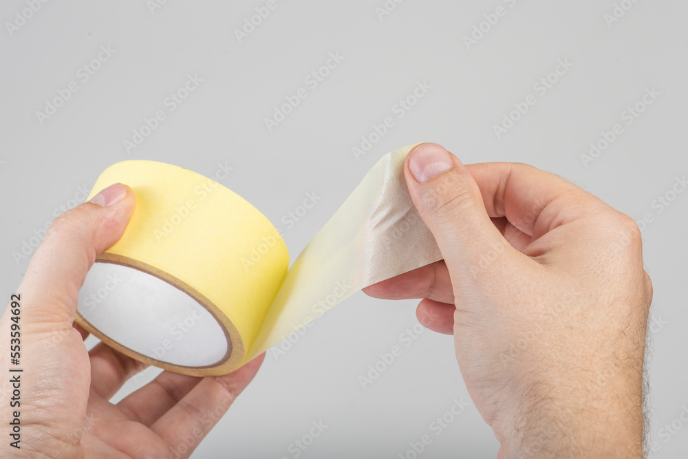 Paper adhesive tape isolated on white. A roll of paper duct tape in the ...