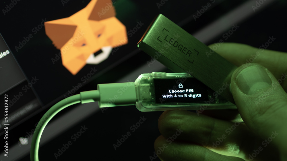 Focus on the screen of an hardware crypto wallet Ledger, Metamask in ...