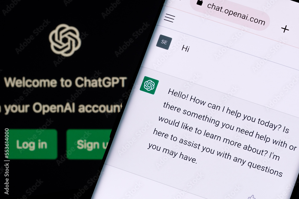 ChatGPT chat bot screen seen on smartphone and laptop display with Chat GPT login screen on the ...