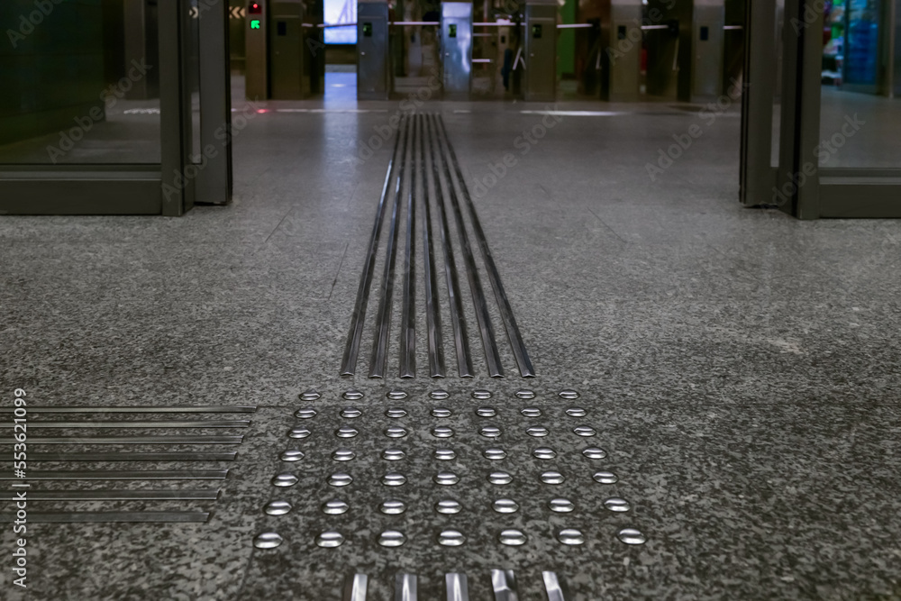 Floor tiles with tactile ground surface indicators, closeup Stock Photo ...