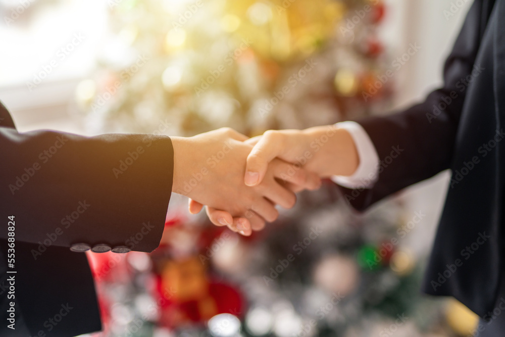 Close up photo of handshake of two young smart beautiful asian lady ...