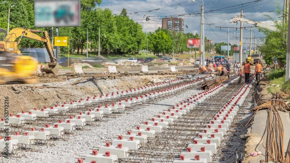 Repair works on the street timelapse. Laying of new tram rails on a ...
