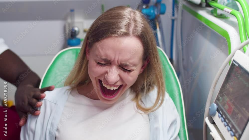 Vídeo do Stock: Close-up view face of young pregnant woman shouting and ...