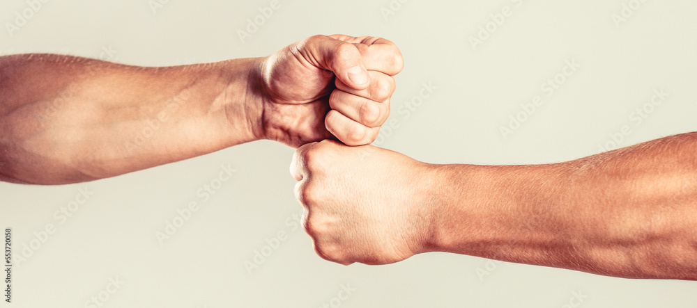 Team concept. People bumping their fists together, arms. Friendly ...