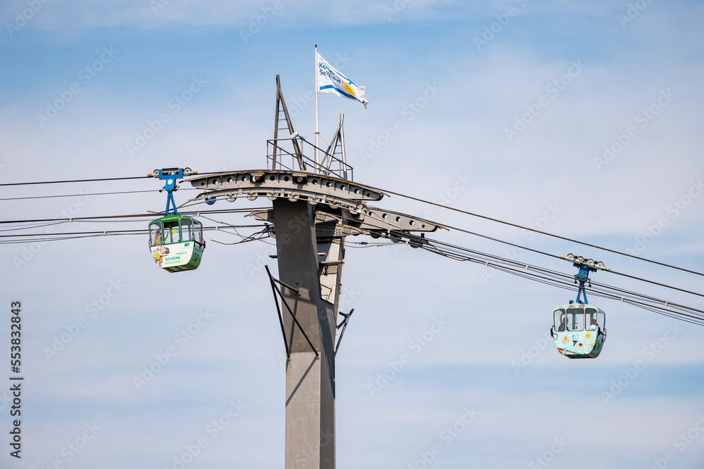 30 July 2022, Cologne, Germany: Seilbahn cable car gondolas ...
