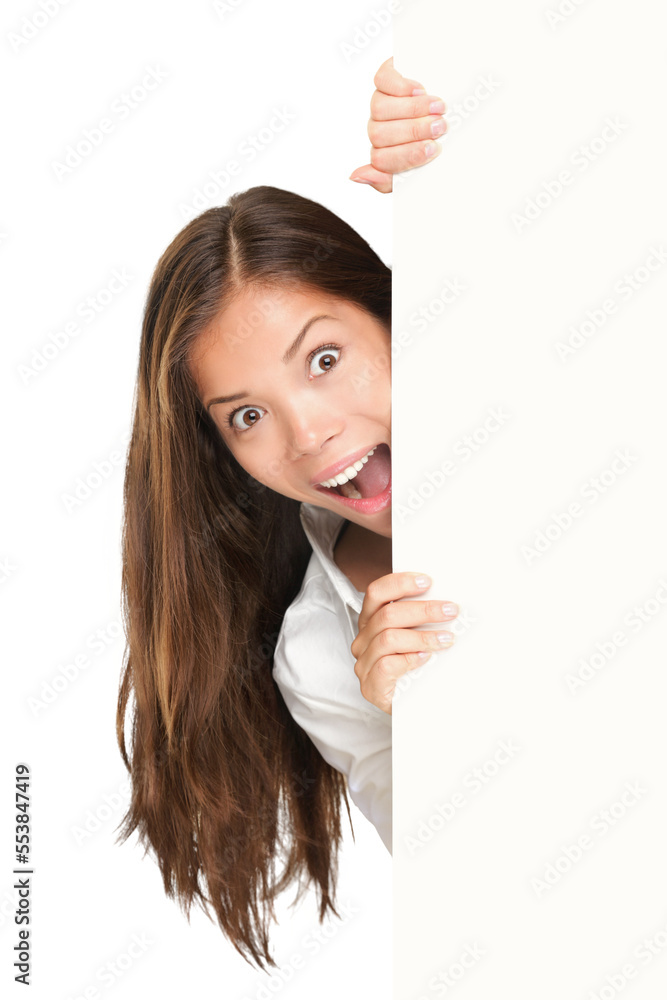 Sign people - woman peeking over billboard paper poster. Excited woman ...