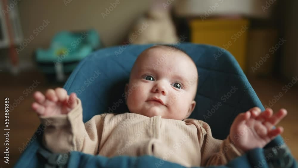 Video Stock newborn baby in a rocking chair. happy family kid dream ...