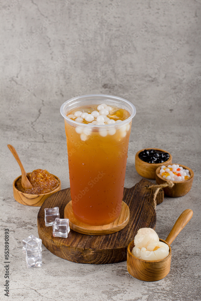 Boba or tapioca pearls is taiwan bubble milk tea in plastic cup with ...